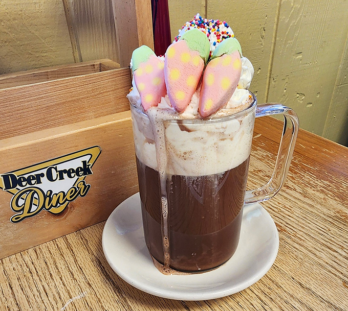 Hot chocolate elevated to art form status with colorful marshmallows and sprinkles&mdash;childhood nostalgia served in a mug emblazoned with the diner's logo.