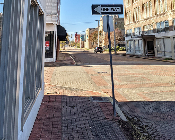 One-way streets in downtown Alexandria guide visitors through a business district where local shops still outnumber national chains.