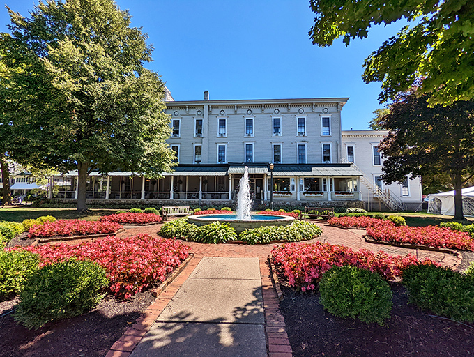 The historic Hotel Lakeside stands proudly behind gardens so meticulously maintained they make your home landscaping look like amateur hour.
