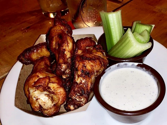 Wings that have clearly been introduced to smoke properly&mdash;crispy, succulent, and served with cooling celery and dip. Finger-licking isn't just allowed, it's expected.