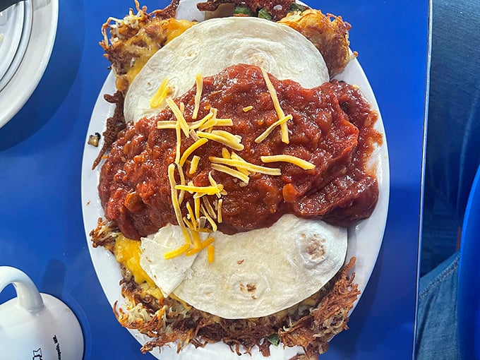 Huevos Rancheros that transport you straight to flavor town, with crispy hashbrowns as the foundation for this morning fiesta.