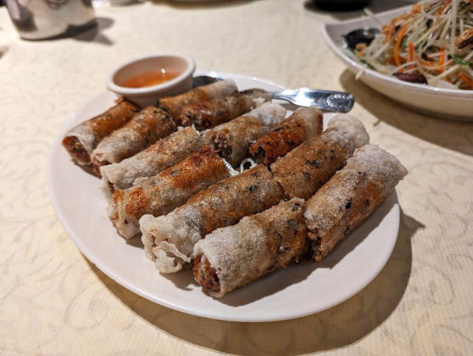 Imperial rolls lined up like delicious sentinels&mdash;crispy, golden armor protecting the savory treasures of pork, taro, and silver noodles within.