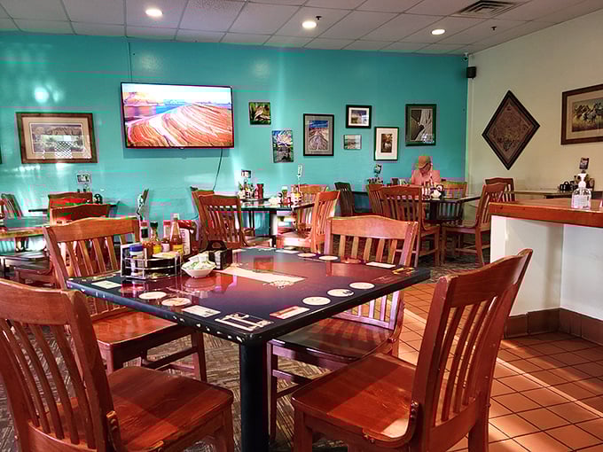Turquoise walls and wooden tables create the perfect backdrop for food that doesn't need fancy surroundings to shine&mdash;it knows its worth.