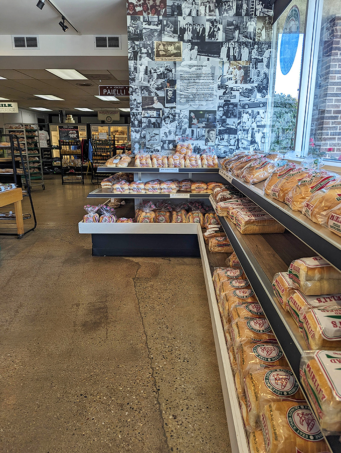The collage wall tells stories while bread loaves tell you to abandon your diet plans and live a little more deliciously today.