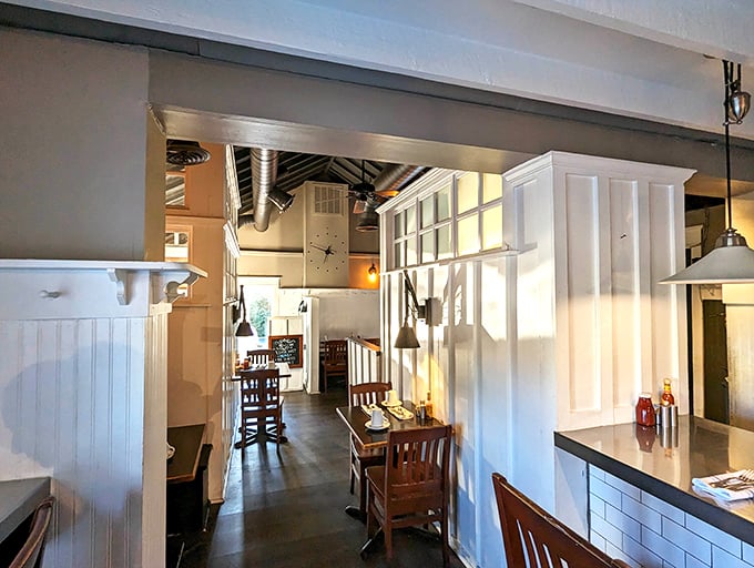 The dining room's thoughtful design creates distinct spaces that feel both private and connected. Architecture that understands the breakfast mindset.