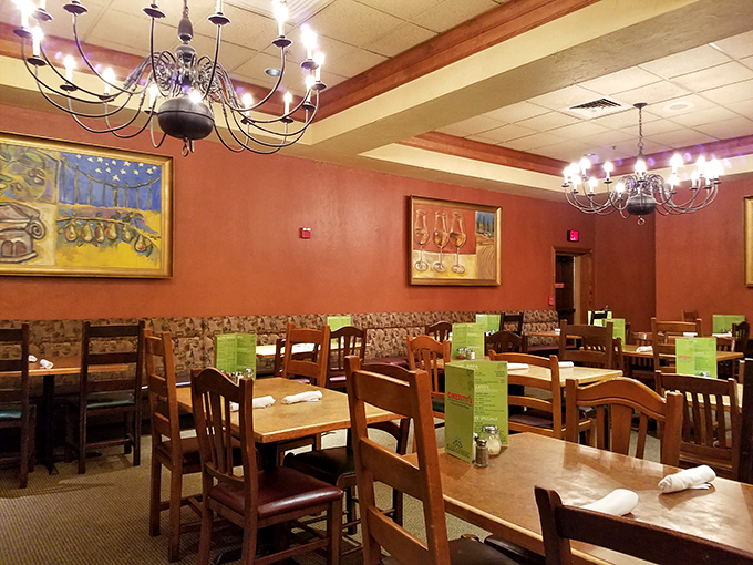 The dining room's warm ambiance and rustic chandeliers create the perfect setting for the serious business of enjoying multiple plates of pasta.