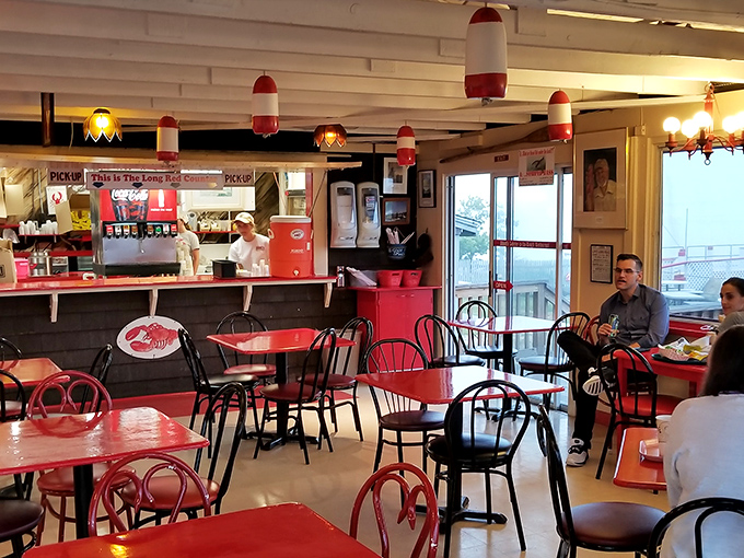 The dining room buzzes with the energy of a maritime social club where the only membership requirement is an appreciation for perfectly cooked seafood.