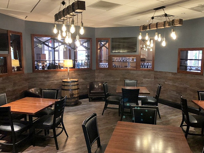 The bourbon barrel aesthetic creates a cozy nook for serious eating. Those Edison bulb fixtures aren't just trendy—they're spotlighting your next great meal.