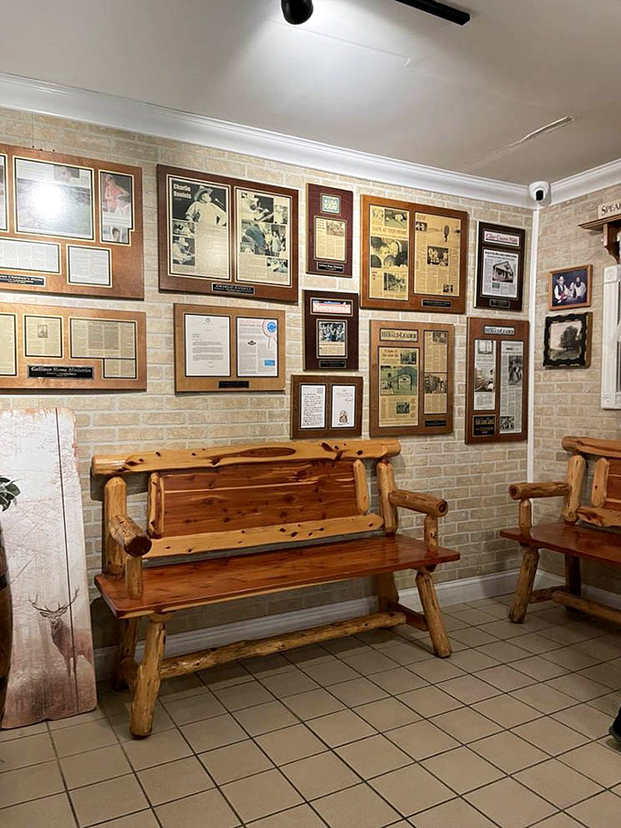 The walls tell stories while you eat&mdash;framed memories and rustic wooden benches create a waiting area that feels more like a family room.
