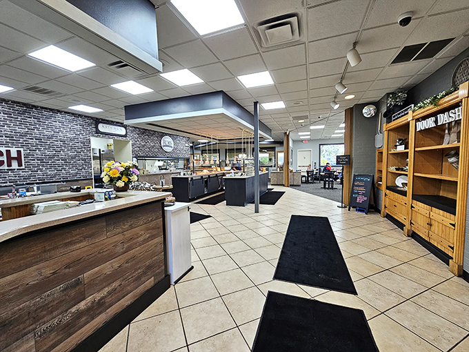 The entrance area blends rustic wood with modern touches, creating that "we've-been-here-forever-but-keep-things-fresh" vibe that's increasingly rare.