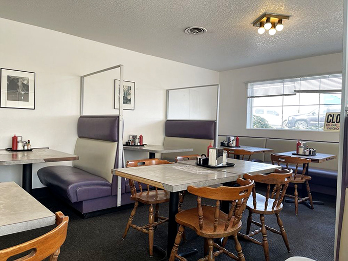 Another angle of diner perfection&mdash;where purple booths meet wooden chairs and every table tells a story. Breakfast democracy in action.