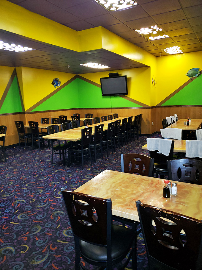 That bright yellow wall has seen more birthday celebrations than a Chuck E. Cheese, but with significantly better food.