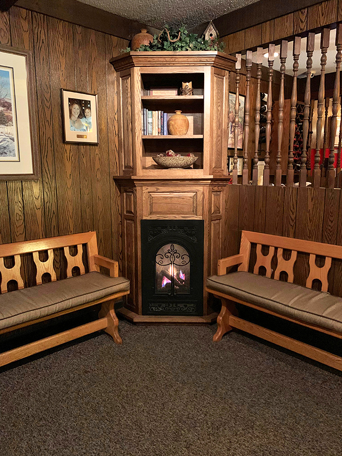 This cozy corner with its fireplace feels like grandpa's den, if grandpa had excellent taste in furniture.