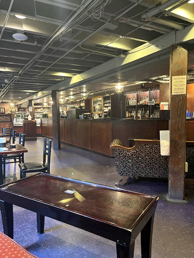 The bar area: where coffee by day transforms into something stronger by night. Same cozy vibe, slightly different buzz.