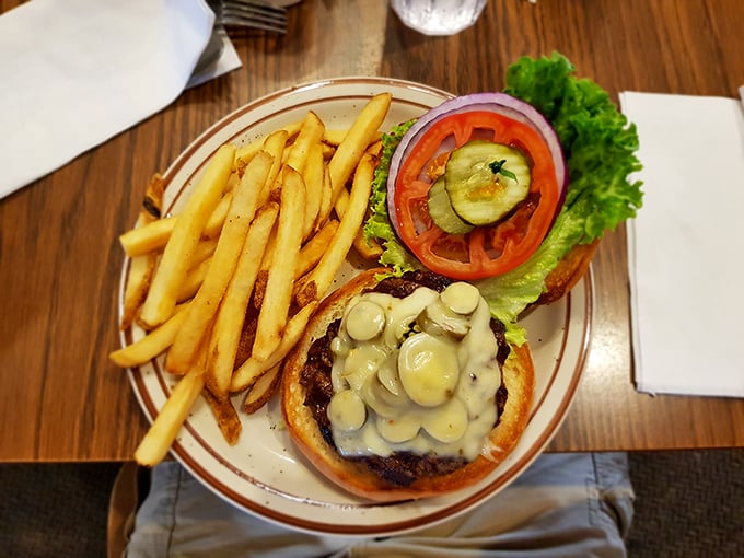 A Jalapeno burger that requires strategic planning before the first bite. Those mushrooms aren't just toppings&mdash;they're co-stars in this delicious production.