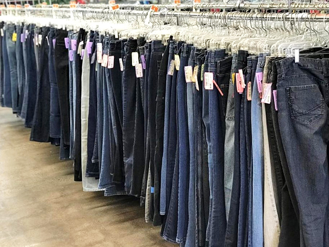 Denim dreams line up like soldiers ready for inspection. From mom jeans to skinny fits, finding your perfect pair becomes a treasure hunt with actual treasure.