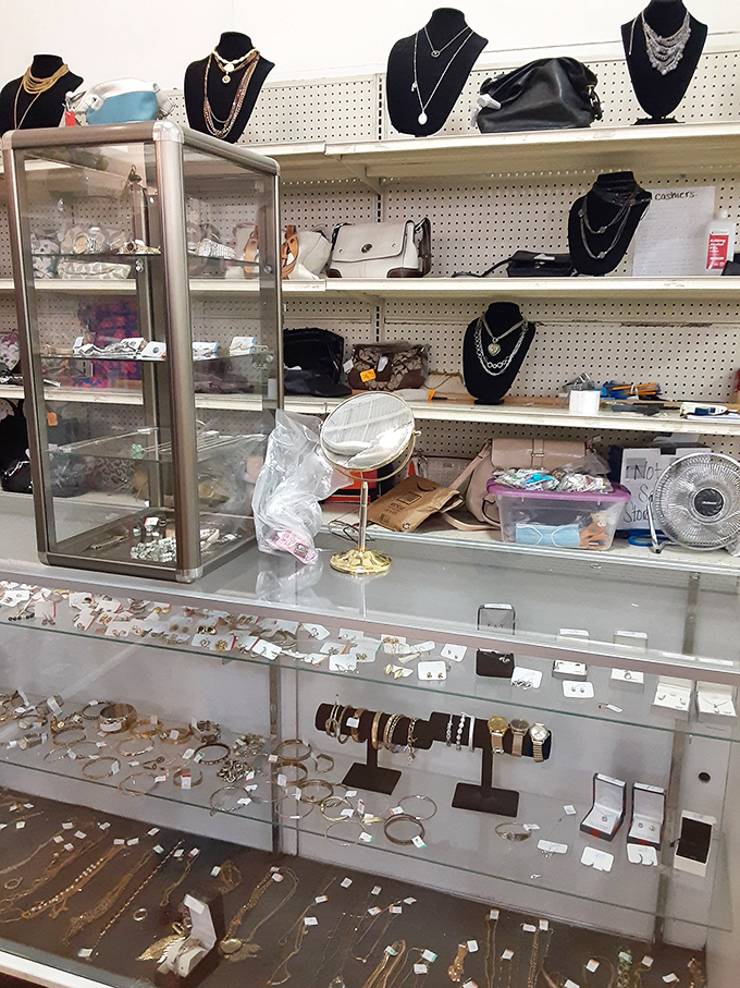 Jewelry display cases glittering with possibility &ndash; accessorize your thrift store outfit without breaking your thrift store budget.