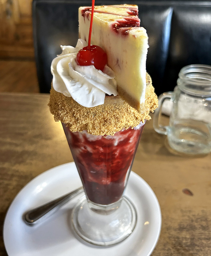 Not just dessert, but a celebration in a glass! This towering knickerbocker glory makes adult me high-five my inner eight-year-old.