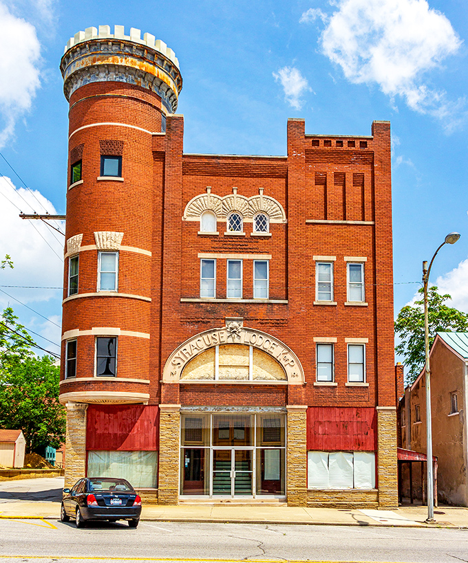 The Syracuse Lodge building stands like an architectural exclamation point—part castle, part time machine, all character.