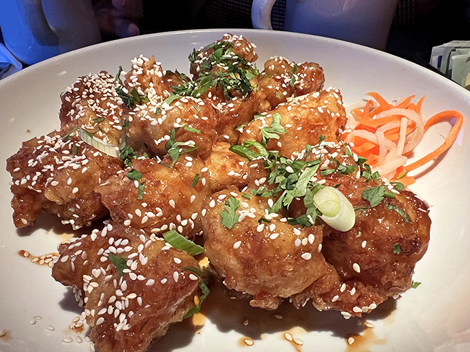 Korean-inspired cauliflower that could convert even dedicated carnivores&mdash;crispy, sticky, and sprinkled with sesame seeds and scallions for the perfect finish.