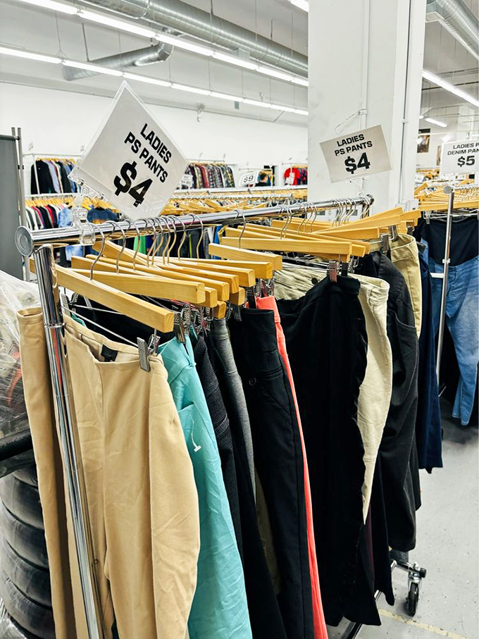 Ladies' pants organized by size and style&mdash;because even secondhand shopping deserves first-class organization and respect.