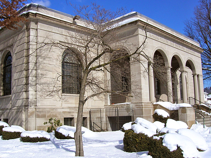The Laughlin Memorial Library stands snow-capped and dignified, like a professor who refuses to cancel class during a blizzard.