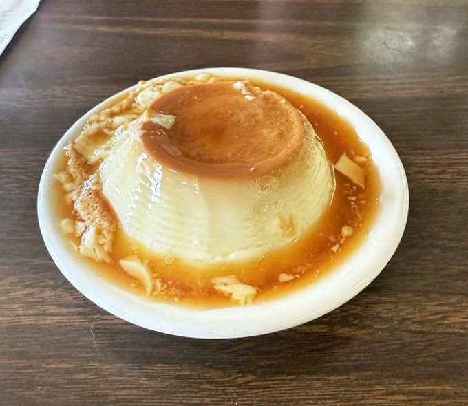 Leche flan that jiggles with just the right amount of attitude. Caramel pooling around it like liquid gold in the Nevada sunshine.