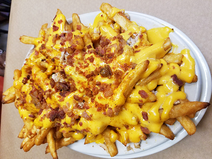 Crab cheese fries&mdash;because regular fries weren't indulgent enough. The Chesapeake Bay meets comfort food in a glorious caloric celebration.