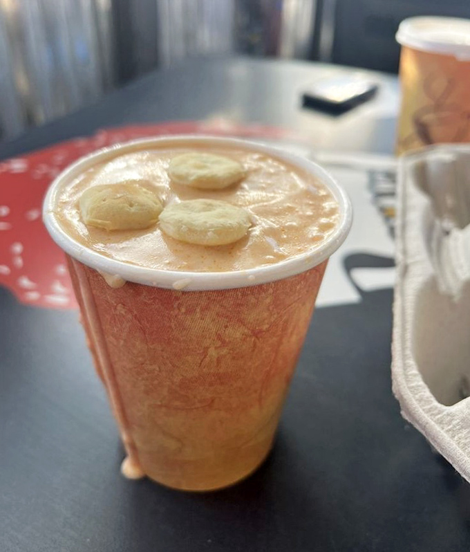 This lobster bisque isn't just soup; it's a warm hug in a cup, topped with oyster crackers that bob like little life preservers.