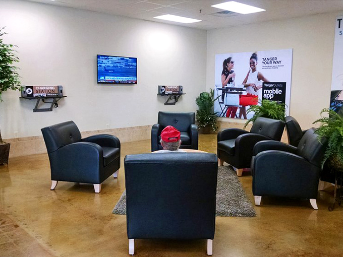 The shopper's recharging station. These sleek lounge areas are retail oases where spouses wait patiently while wallets recover from recent trauma.