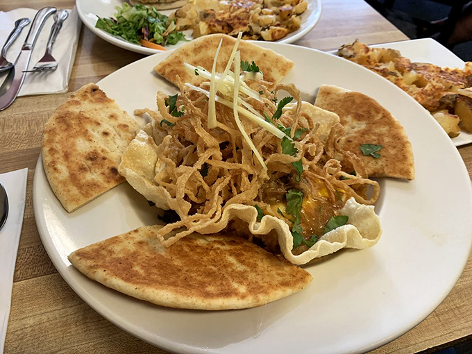 Malaysian spiced pulled pork wrapped in crispy goodness &ndash; your morning commute never tasted this adventurous.