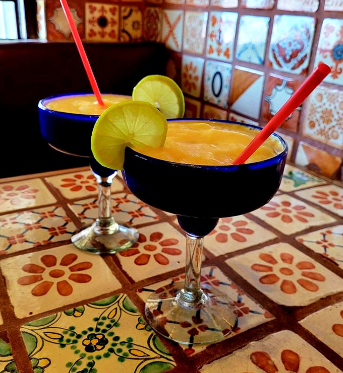These mango margaritas aren't just drinks; they're vacation in a glass, rimmed with salt and possibilities.