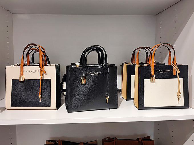 Marc Jacobs bags in classic black and white prove that sophisticated style doesn't require sophisticated spending habits.