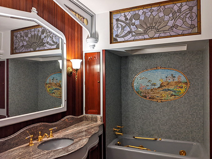 A bathroom fit for royalty with stained glass and nautical mosaics. Indoor plumbing never looked so magnificent&mdash;or took so long to install.
