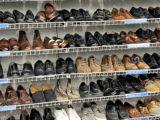 Men's shoes lined up like hopeful contestants on a dating show, each pair with a story and a price tag that'll make you swipe right.