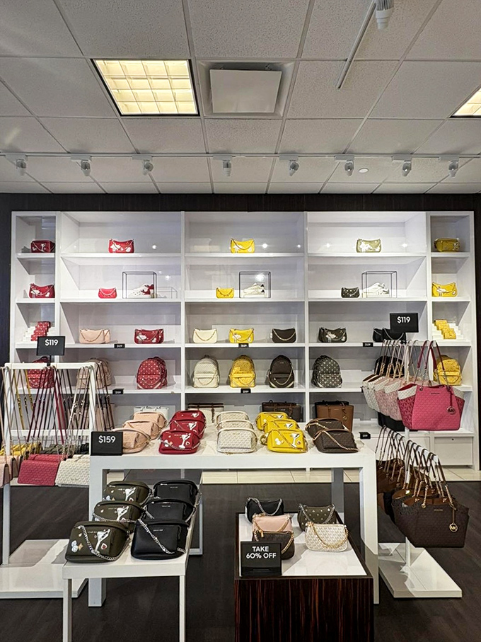 The Michael Kors handbag display&mdash;where wallets come to empty themselves in exchange for arm candy that screams "I've arrived!"