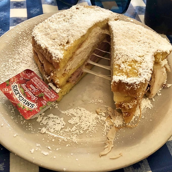 The Monte Cristo: where sandwich meets dessert in a powdered sugar love story. Each bite is a sweet-savory revelation worth every napkin.