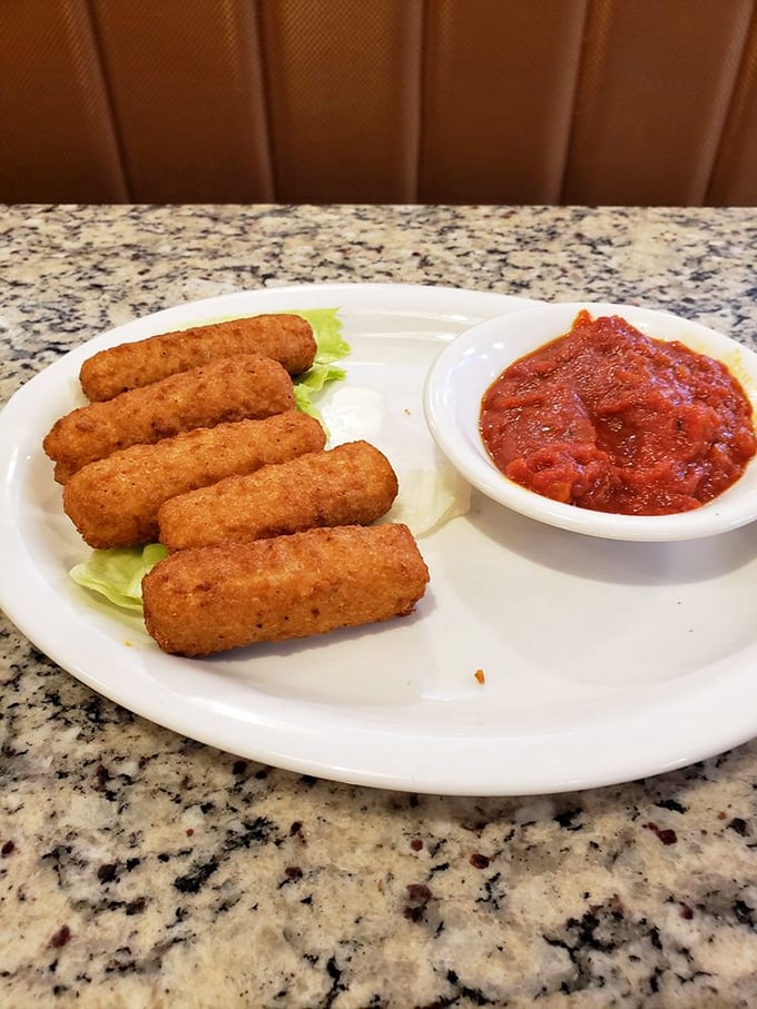 These mozzarella sticks aren't just appetizers&mdash;they're golden-brown ambassadors of cheese, waiting to introduce you to their marinara companion.