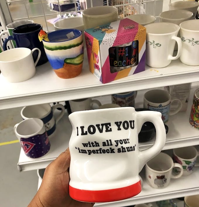 Mugs with personality line the shelves like characters at a reunion. That "imperfeck" one has the charm of a lovable sitcom sidekick.