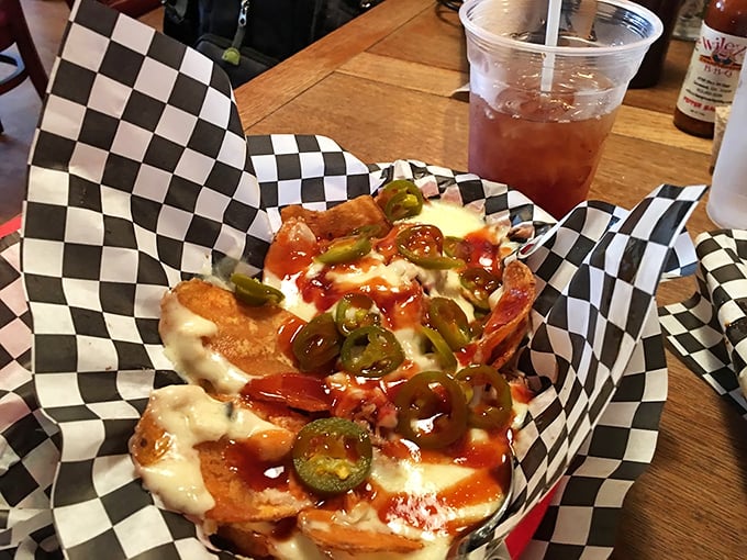 Nachos that laugh in the face of ballpark versions. These loaded beauties demand both hands and plenty of napkins.