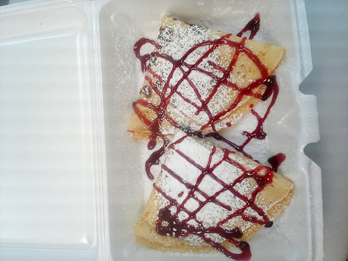 Nalesniki: where crepes went on vacation to Poland and decided to stay forever. That berry sauce is writing love letters to your taste buds.