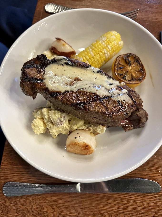 This New York strip with corn and scallops is having a better day than you are. The sear on that beef would make a professional pitmaster question their life choices.