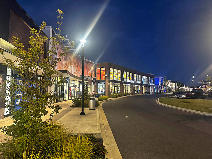 As night falls, the outlets transform into a glowing retail wonderland. Window shopping takes on new magic after sunset.
