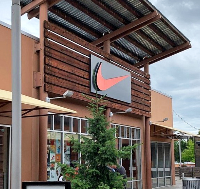 Nike's Pacific Northwest-inspired storefront combines wood elements and clean lines, much like the running shoes that will somehow find their way to your car.