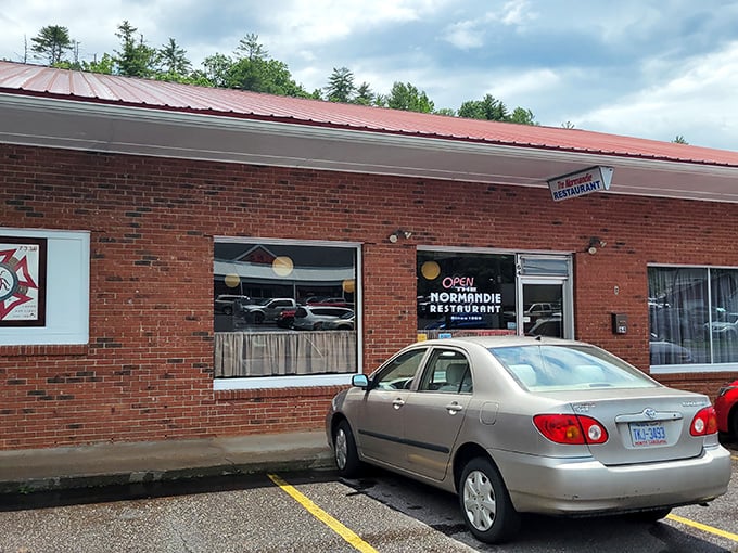 The unassuming exterior of Normandie Restaurant hides what locals know &ndash; sometimes the best meals come from places that spent their budget on food rather than fancy facades.