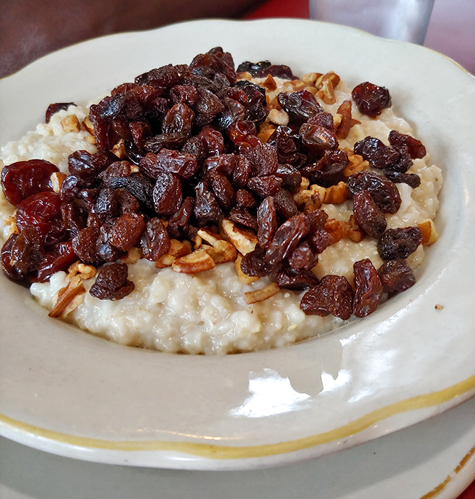 Oatmeal elevated from humble to heavenly with a generous crown of dried fruits and nuts&mdash;comfort food that hugs you from the inside.