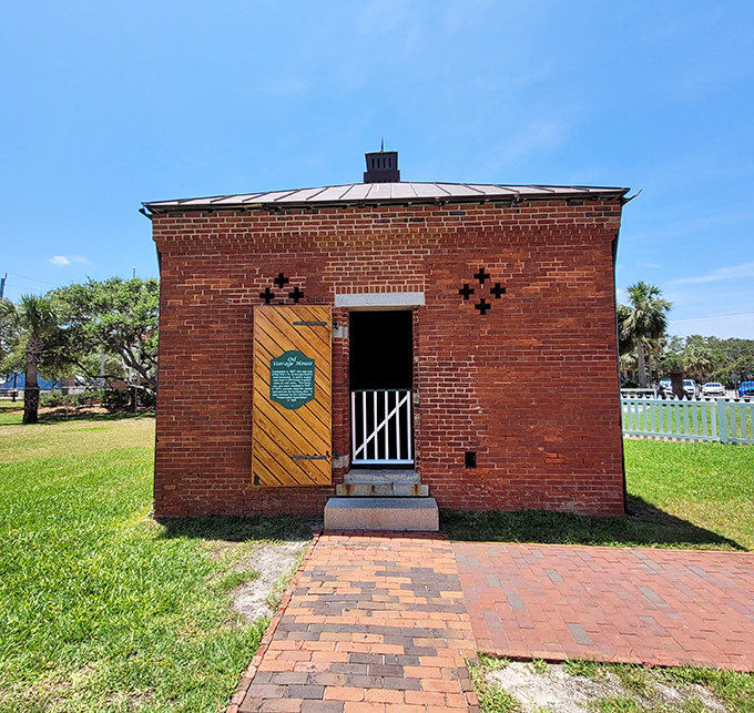 The oil storage house may look modest, but it once held the liquid gold that kept the lighthouse beacon burning through countless dark nights.