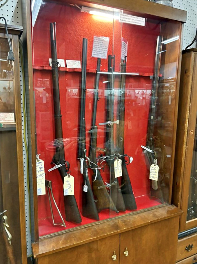 Antique firearms behind glass&mdash;history's hardware store. These long-silent tools tell tales of frontier life when "going viral" meant something entirely different and considerably more concerning. 