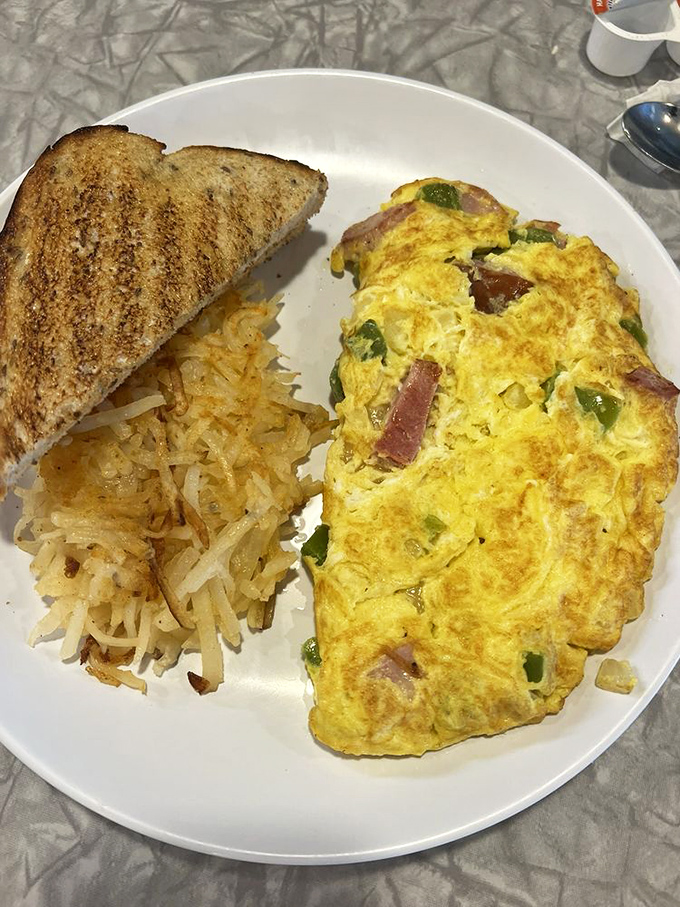 This Western omelet doesn't just contain ham and peppers&mdash;it celebrates them in a fluffy egg embrace.