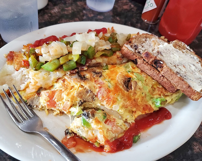 This isn't just an omelet&mdash;it's a technicolor dream of vegetables and cheese that makes plant-eating feel like a celebration.